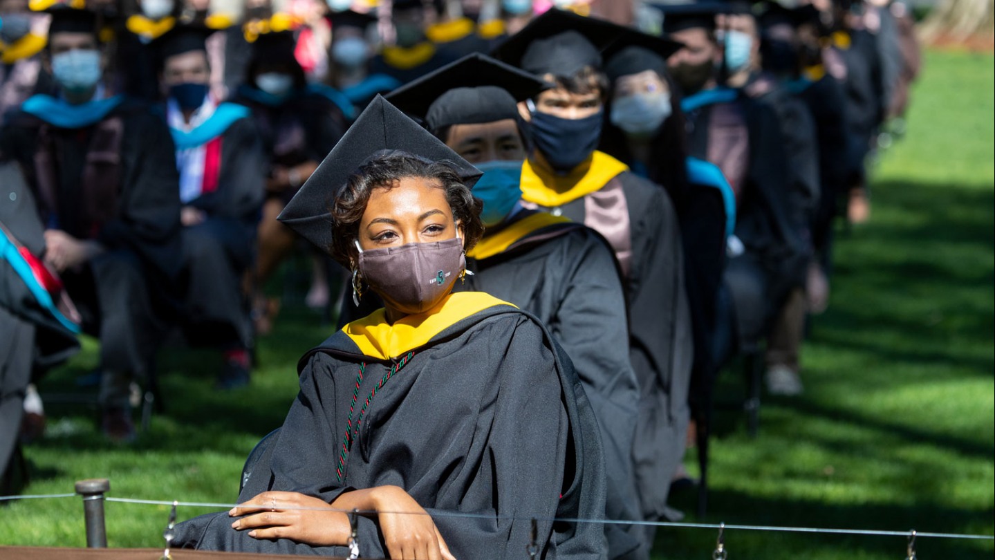 In socially distanced Graduate School ceremony, speakers call on peers ...